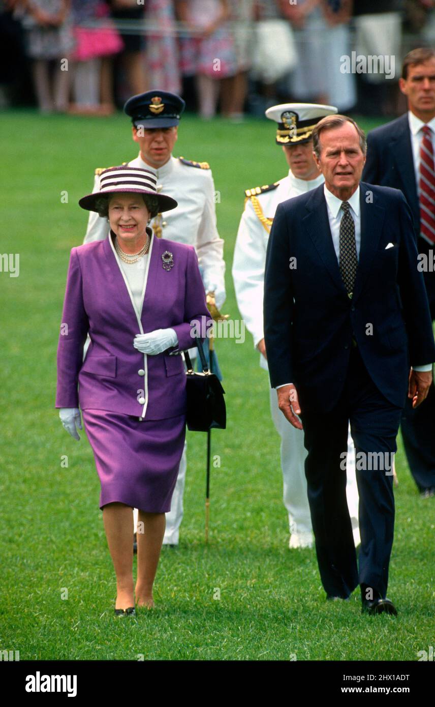 United States President George H.W. Bush, right, walks on the South ...