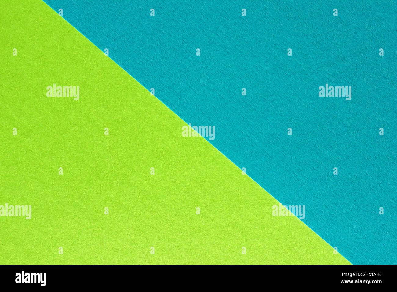 blue and green paper background, divided vertically, cardboard texture ...