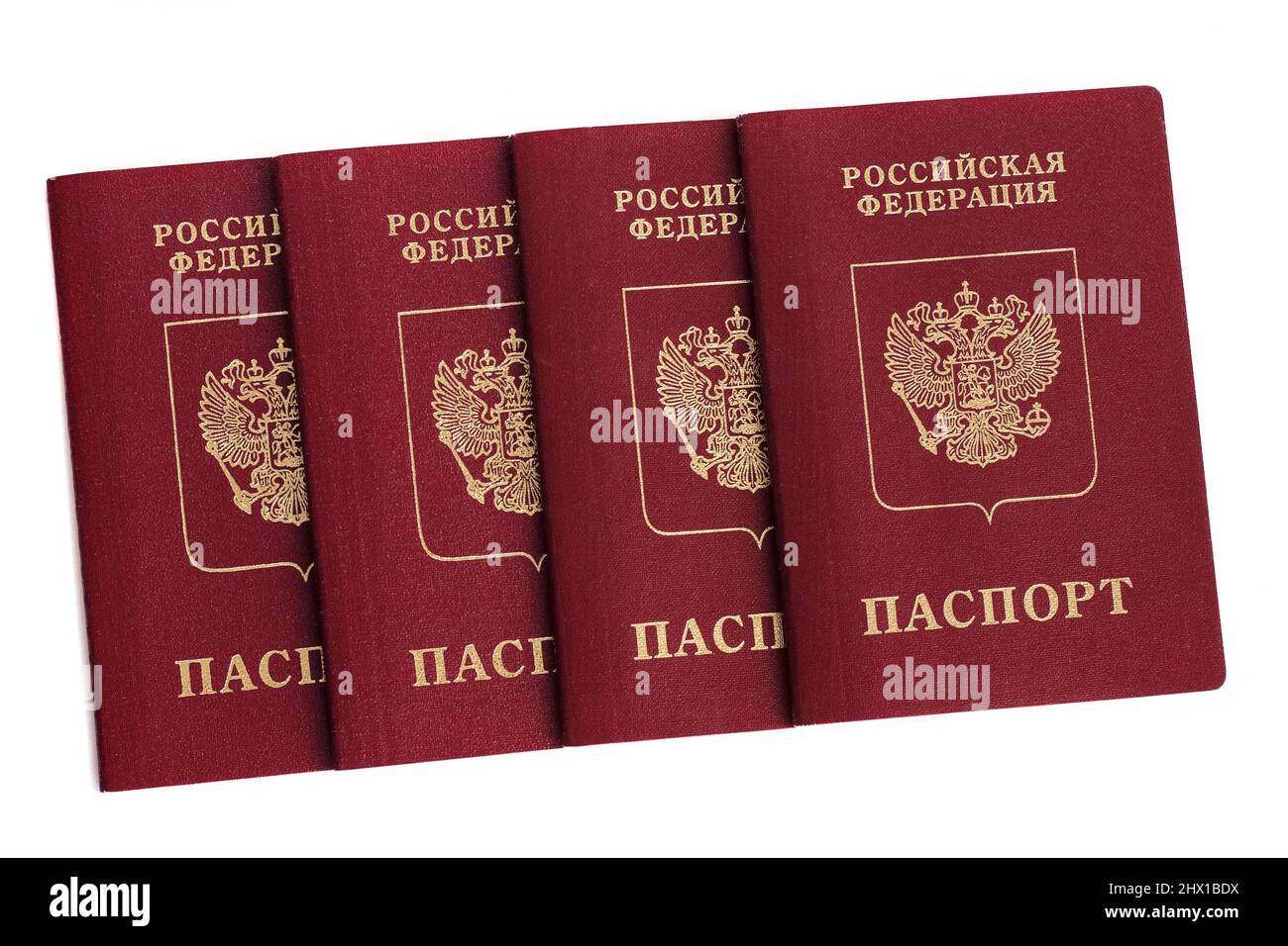 Four Russian passport isolated on white background Stock Photo - Alamy