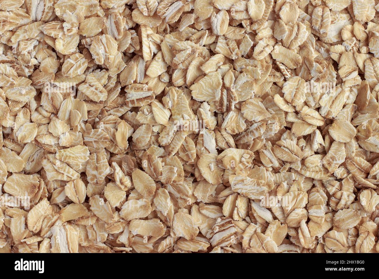 Oat flakes (oatmeal) close-up. Natural and healthy food. Background or ...