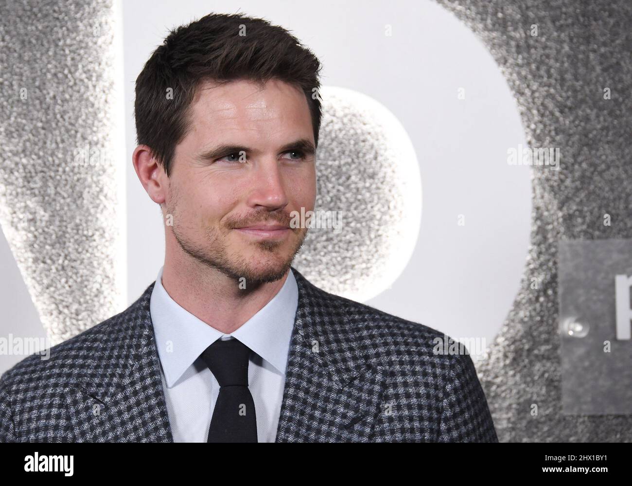 West Hollywood, CA, US, March 8, 2022. Robbie Amell arrives at Amazon ...