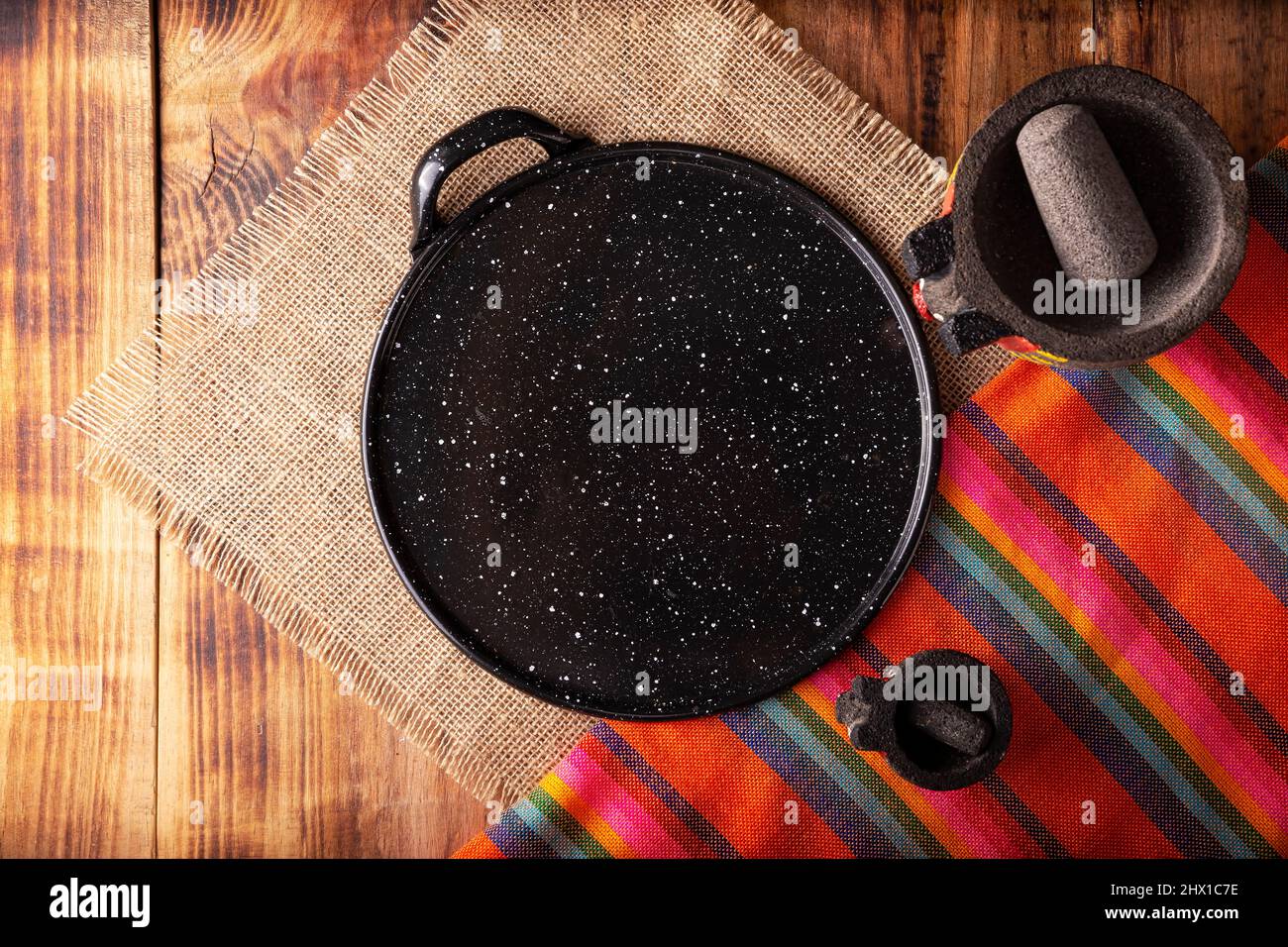 Mexican kitchen utensils, colorful traditional fabric, comal de peltre ...