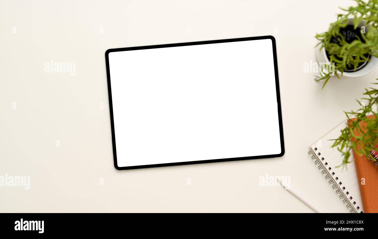 Overhead shot, Smart digital tablet white screen mockup and decors on ...