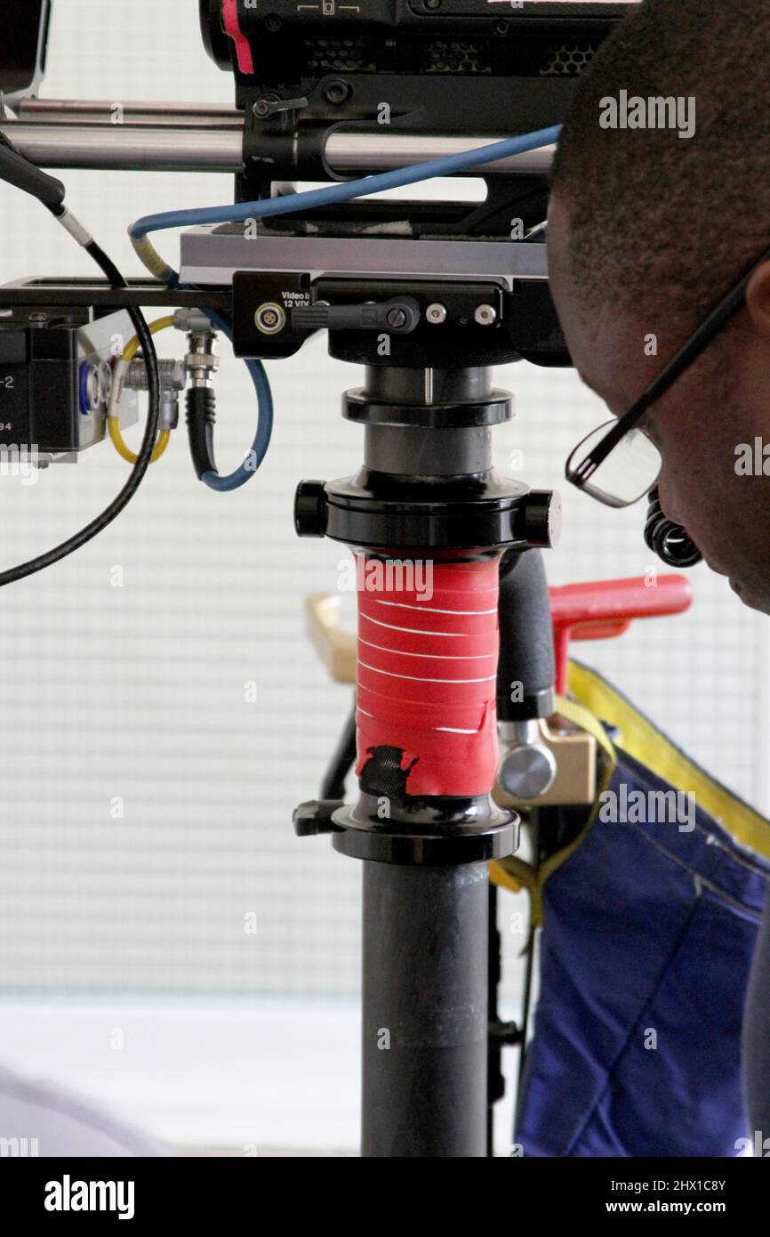 Filming cinema scene crew in action Stock Photo - Alamy