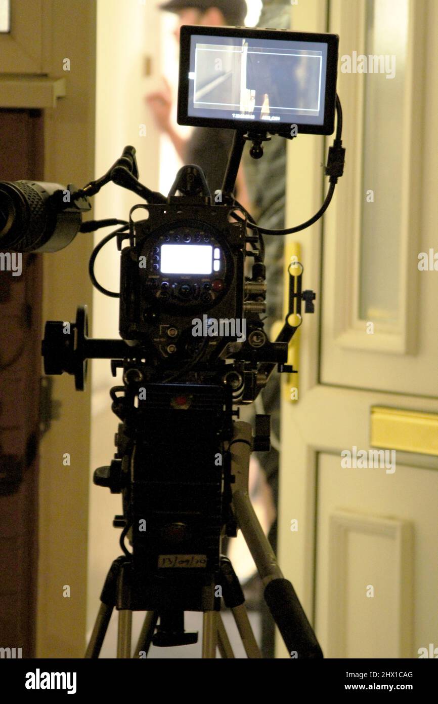 Filming cinema scene crew in action Stock Photo - Alamy