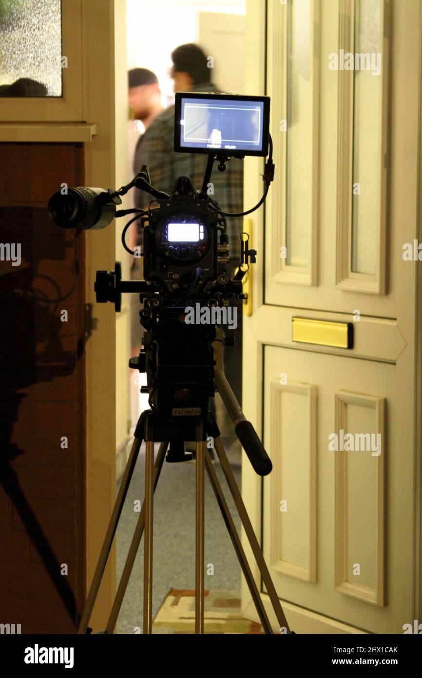 Filming cinema scene crew in action Stock Photo - Alamy