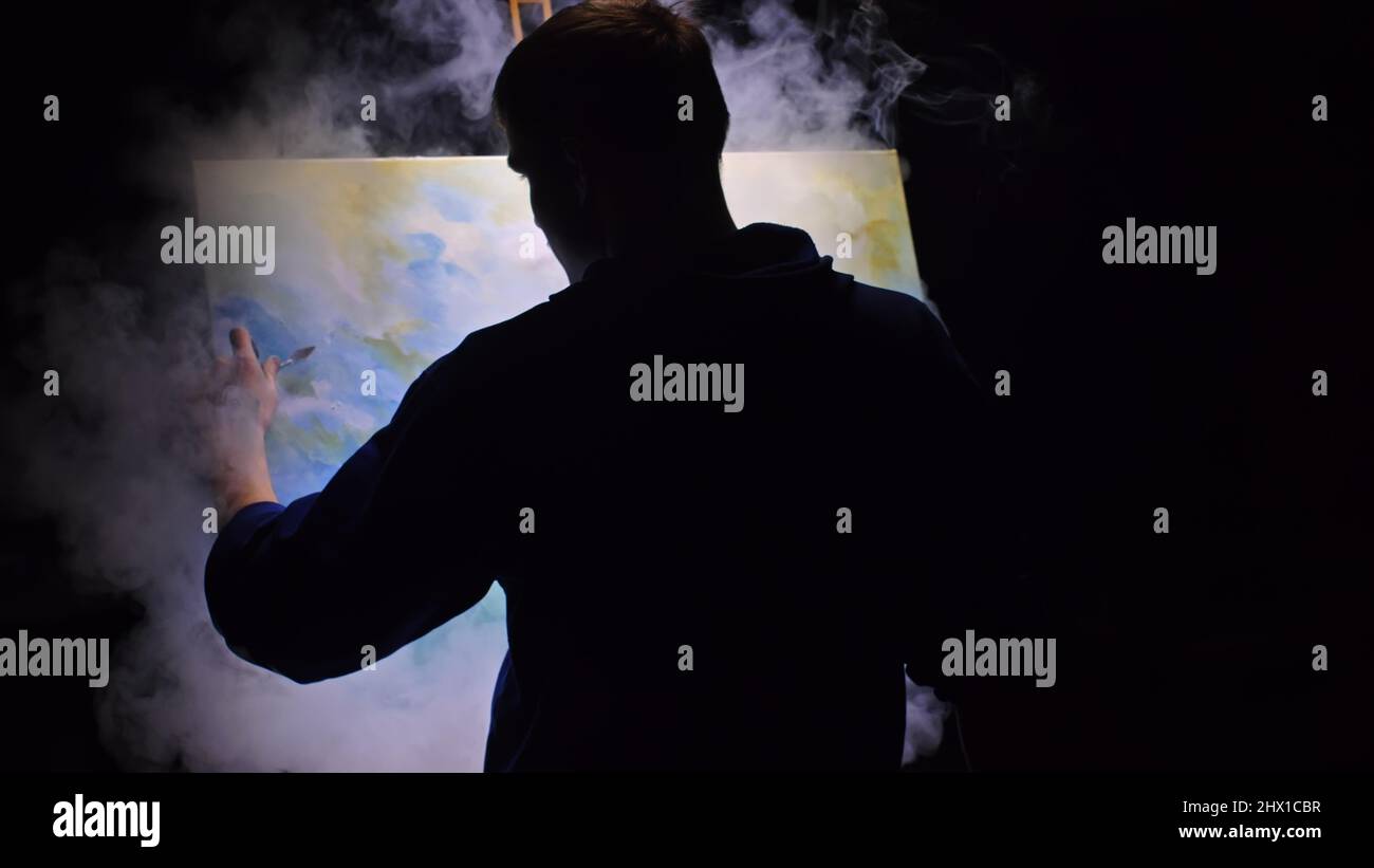 Artist copyist paint seascape with ship in ocean. Vaper smoke vape e ...