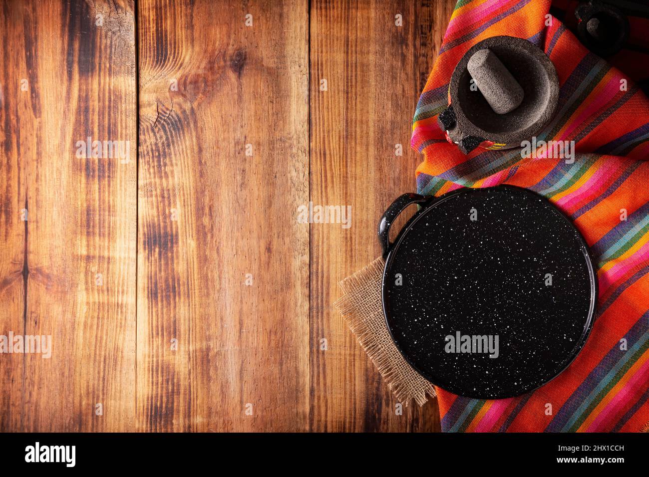 Mexican kitchen utensils, colorful traditional fabric, comal de peltre ...