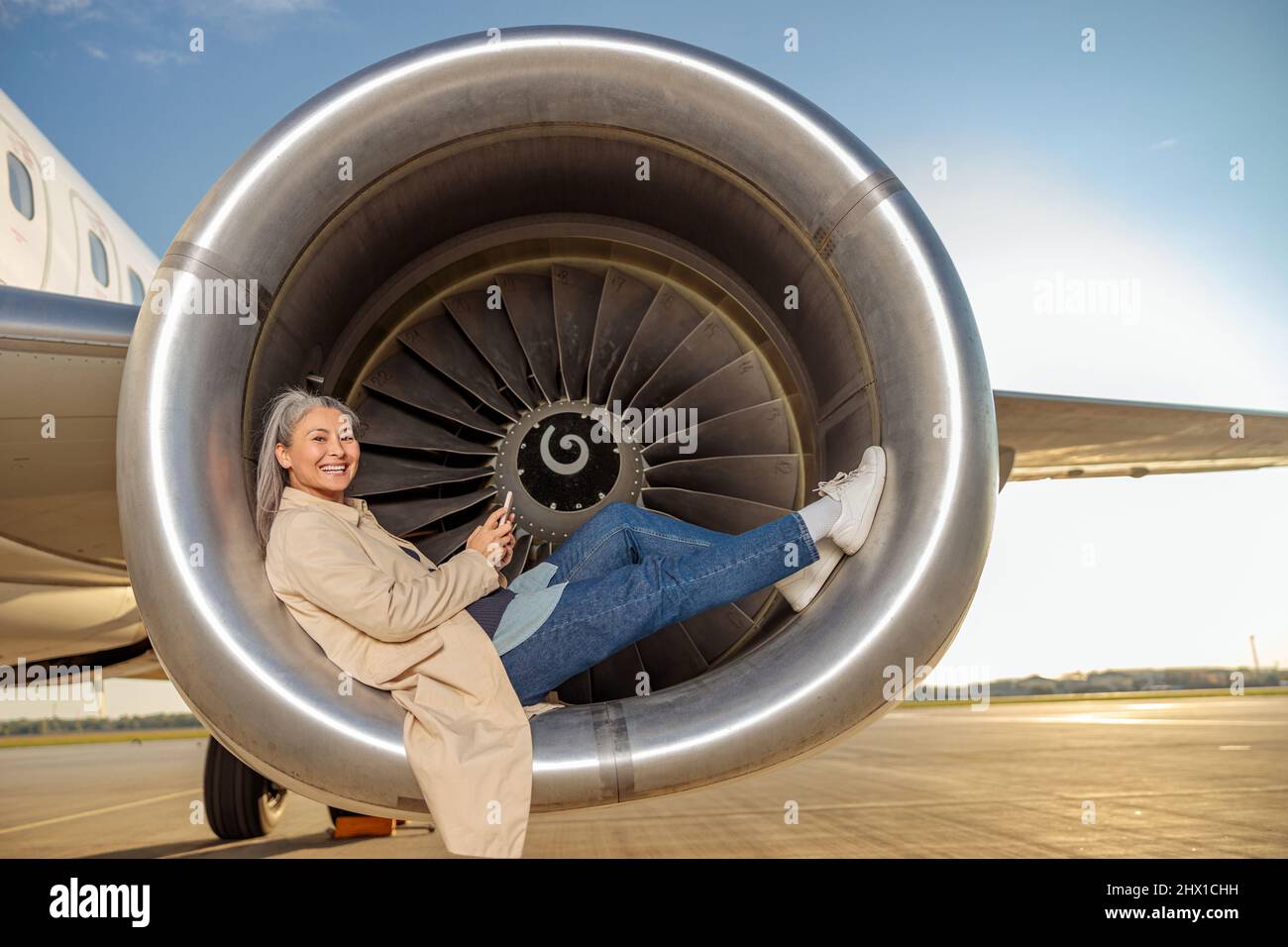 Woman in aircraft hi-res stock photography and images - Alamy