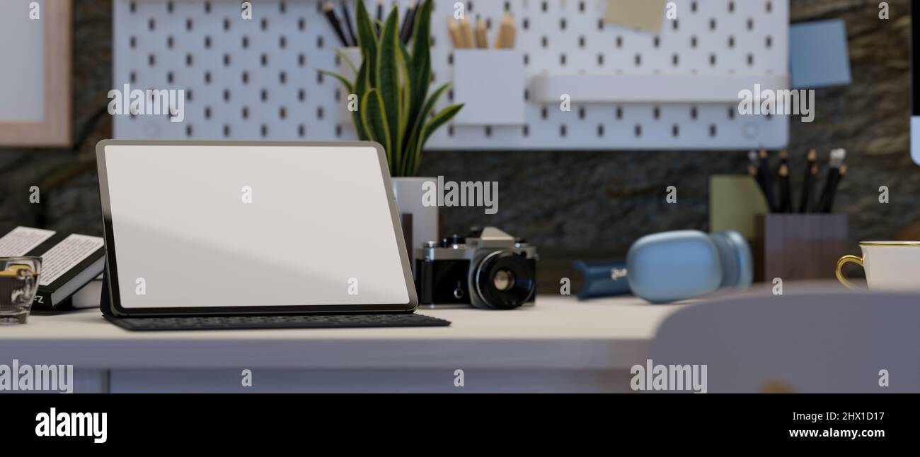 Close-up, Modern hipster working desk with digital tablet white screen ...