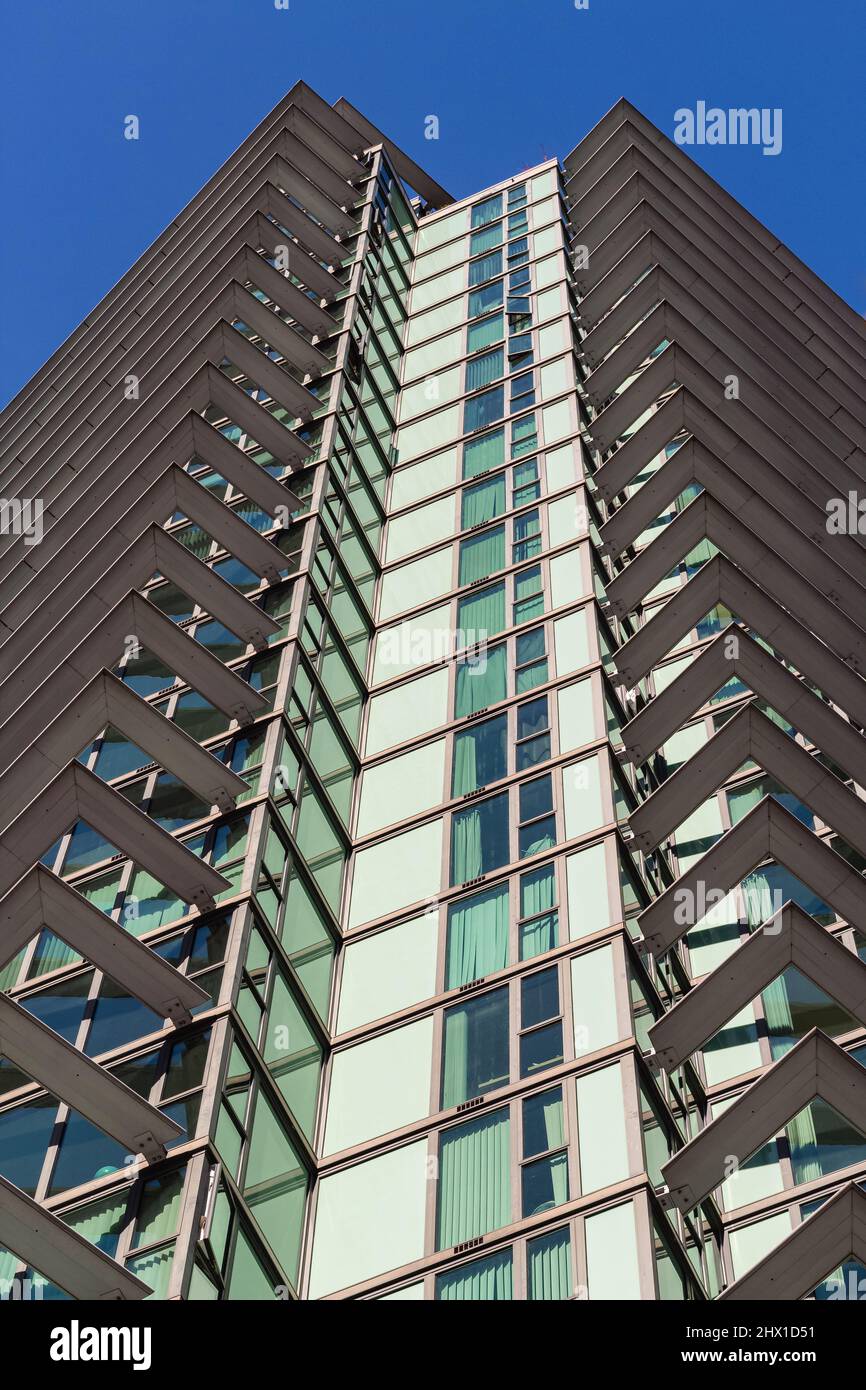 Facade detail of a modern high-rise apartment building. Abstract ...