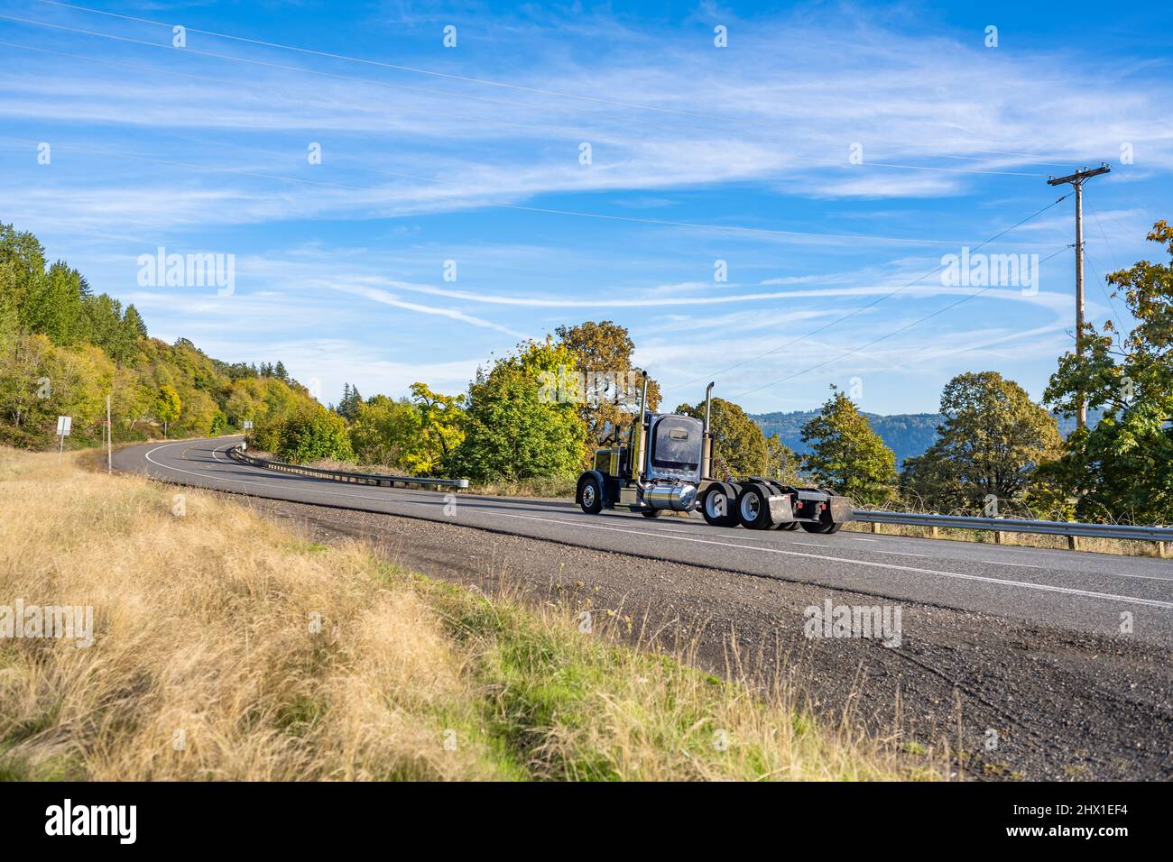 Black industrial big rig classic day cab bonnet semi truck tractor ...