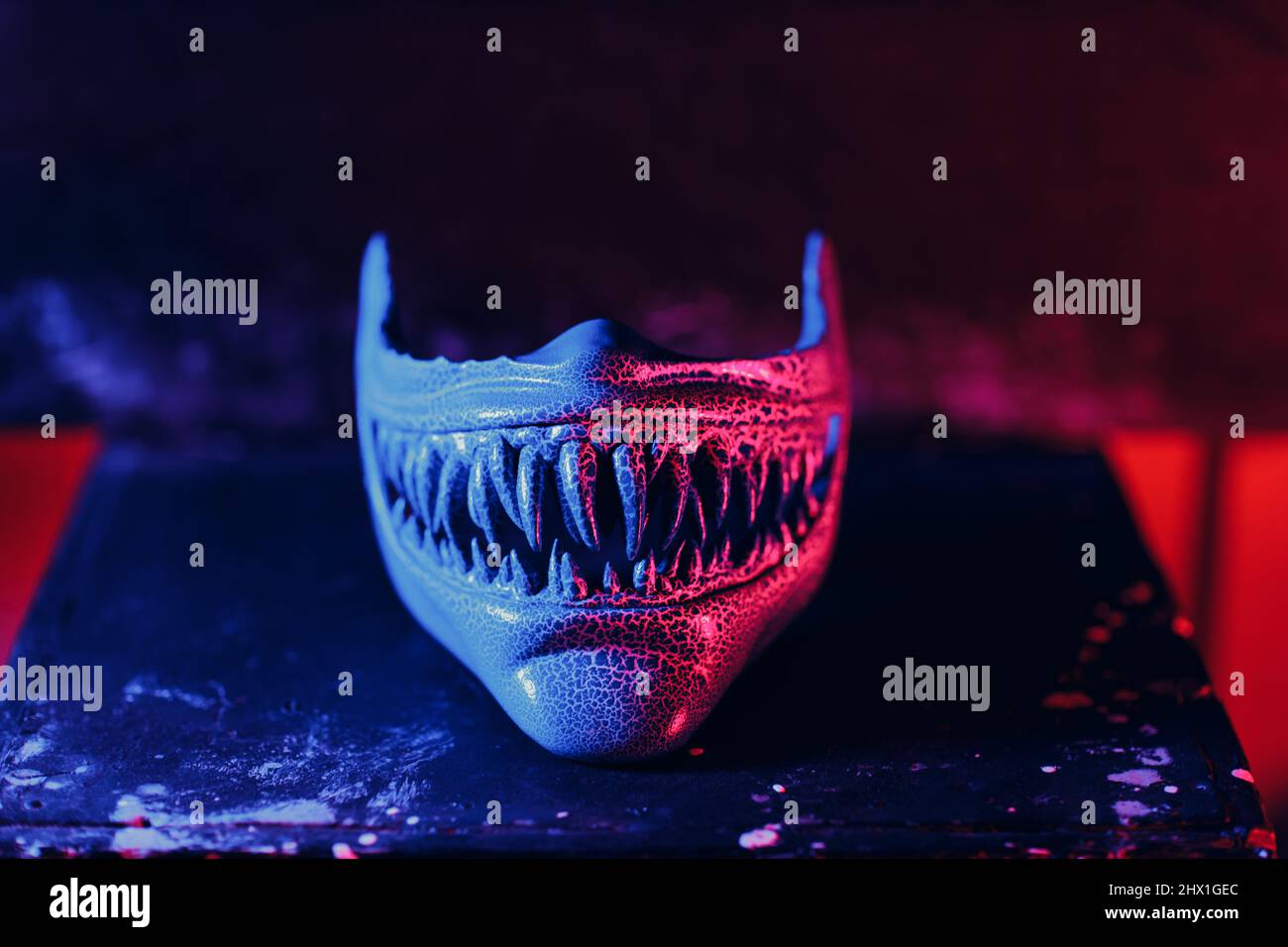 Scary plastic mask. Artisan craftsman create mask based on plaster cast ...