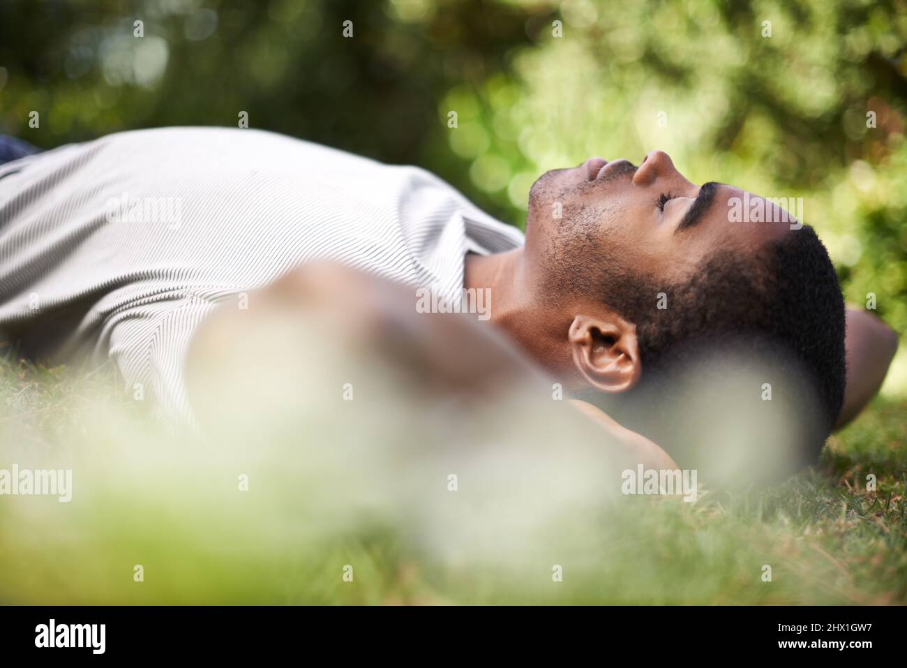 African american man lying on hi-res stock photography and images - Alamy
