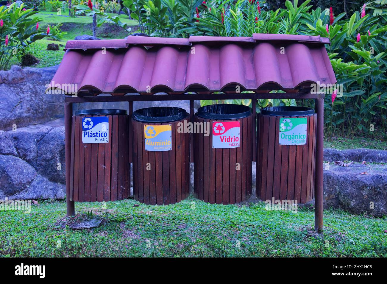Wooden containers in a row for separate garbage Stock Photo - Alamy