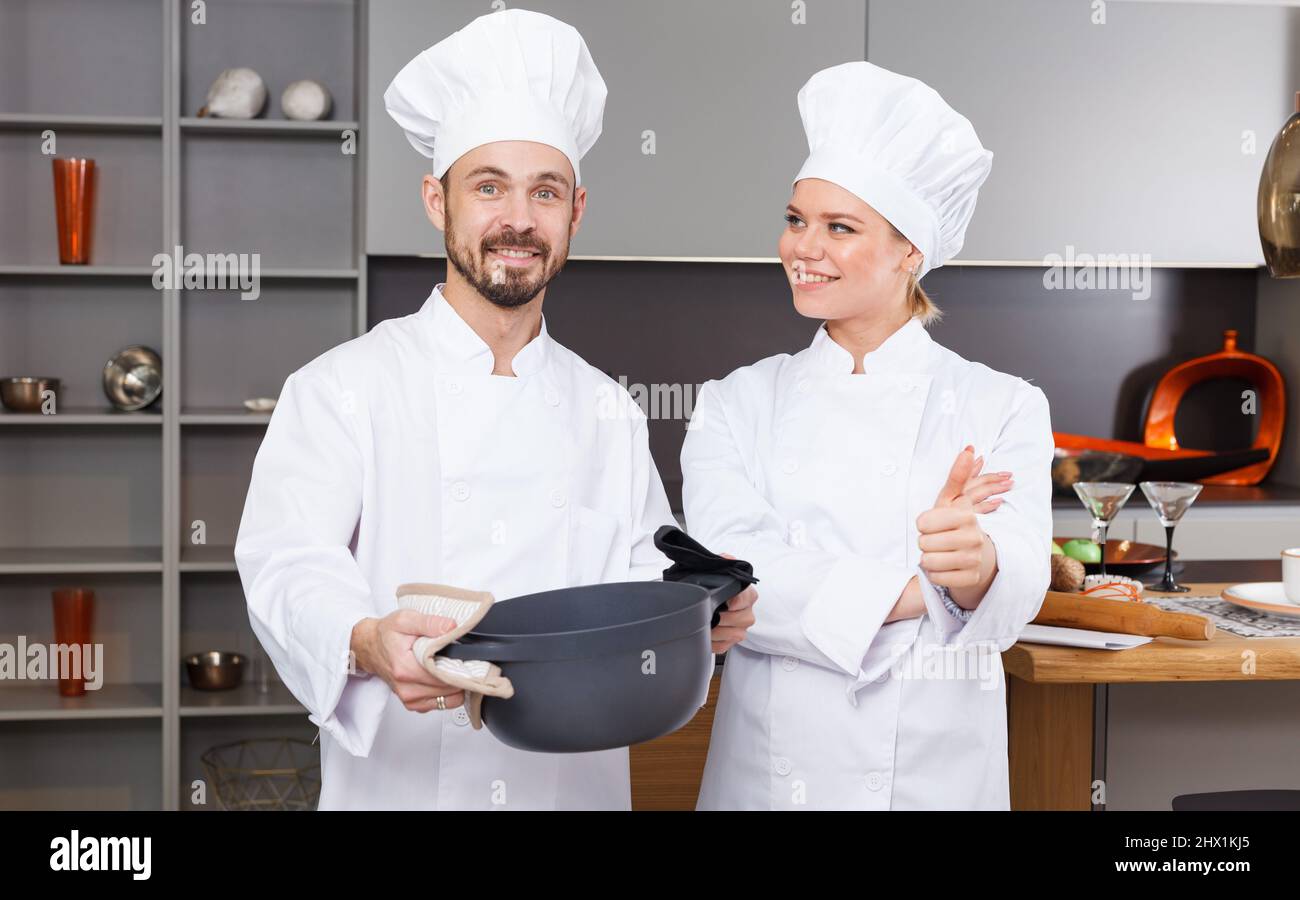 Two confident chefs Stock Photo - Alamy