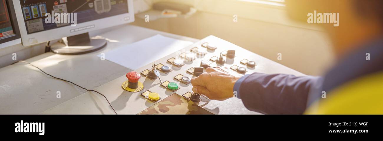 Male engineer using control panel at factory Stock Photo - Alamy Male engineer using control panel at factory Stock Photo - Alamy