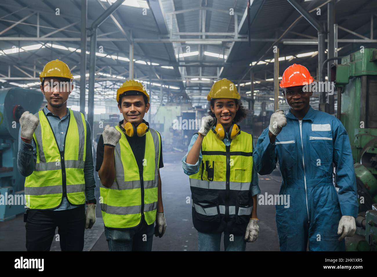 teamwork of engineer and worker team in industry wearing safety helmet ...