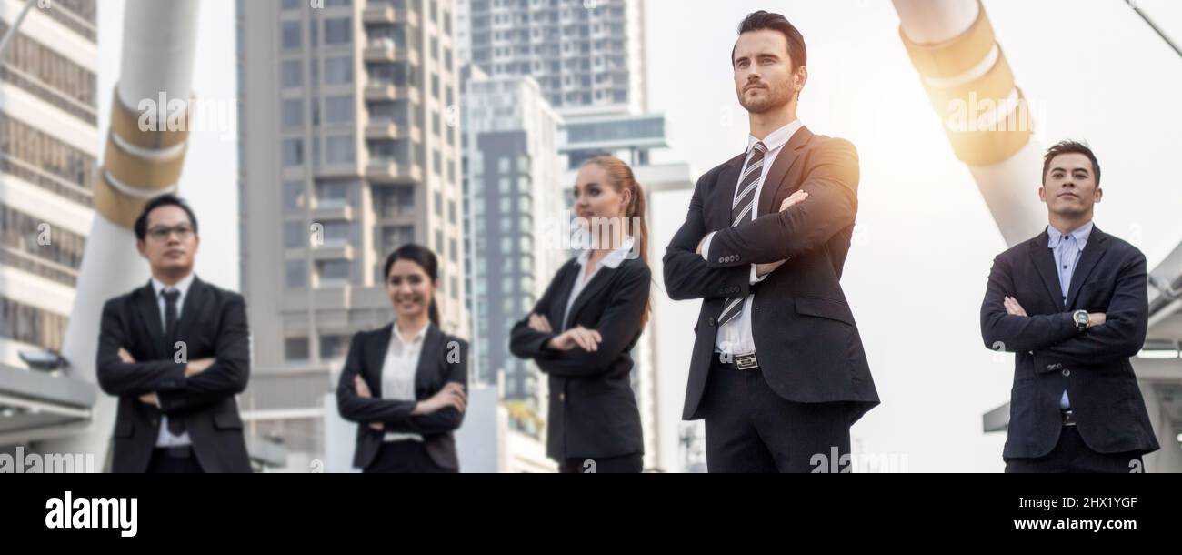 posing with crossed arms, businesspeople headed with boss, smart leader ...
