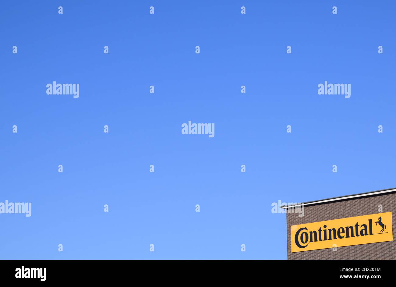 Hanover, Germany. 09th Mar, 2022. A large logo hangs on the corporate ...