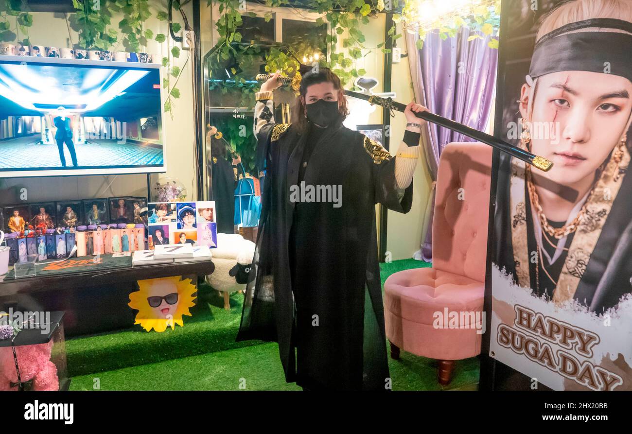 BTS member Suga's birthday, Mar 7, 2022 : A fan from Italy poses at a ...