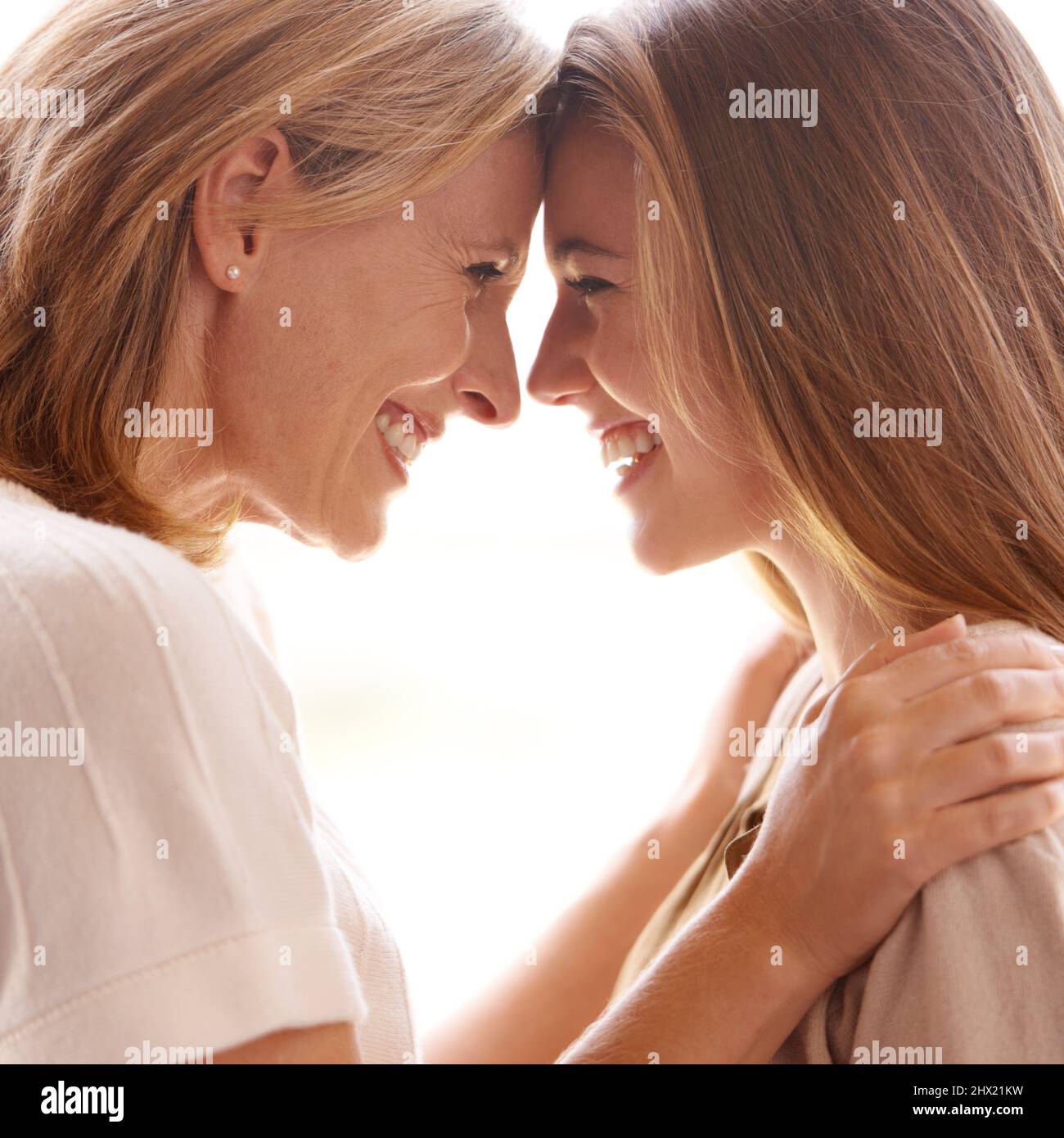 Close up of a mother standing with her daughter hi-res stock ...