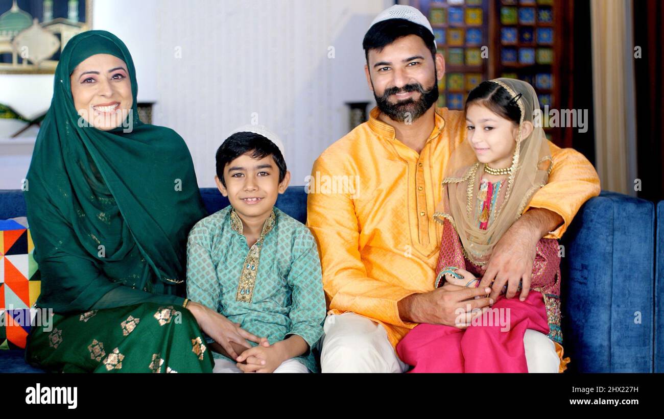 Modern nuclear Muslim family in India - Happy family with two kids and ...