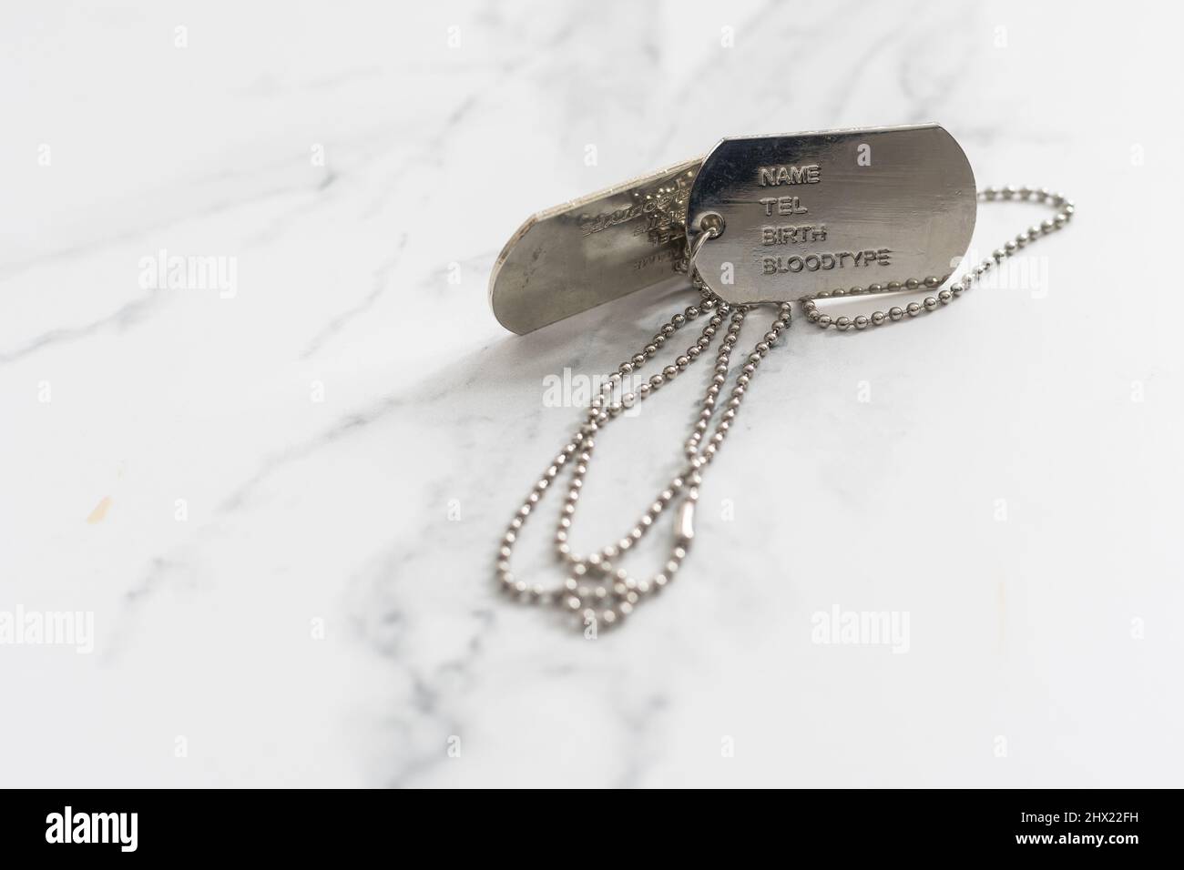 dog tag, army chains on a White Background Stock Photo - Alamy