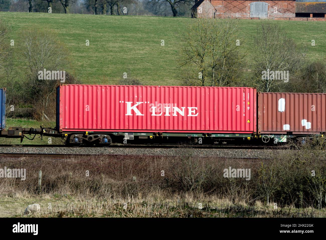 K Line shipping container on a freightliner train, Warwickshire, UK ...