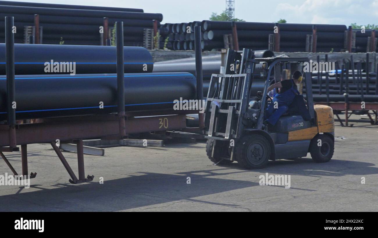 Warehouse of finished plastic pipes industrial outdoors storage site ...