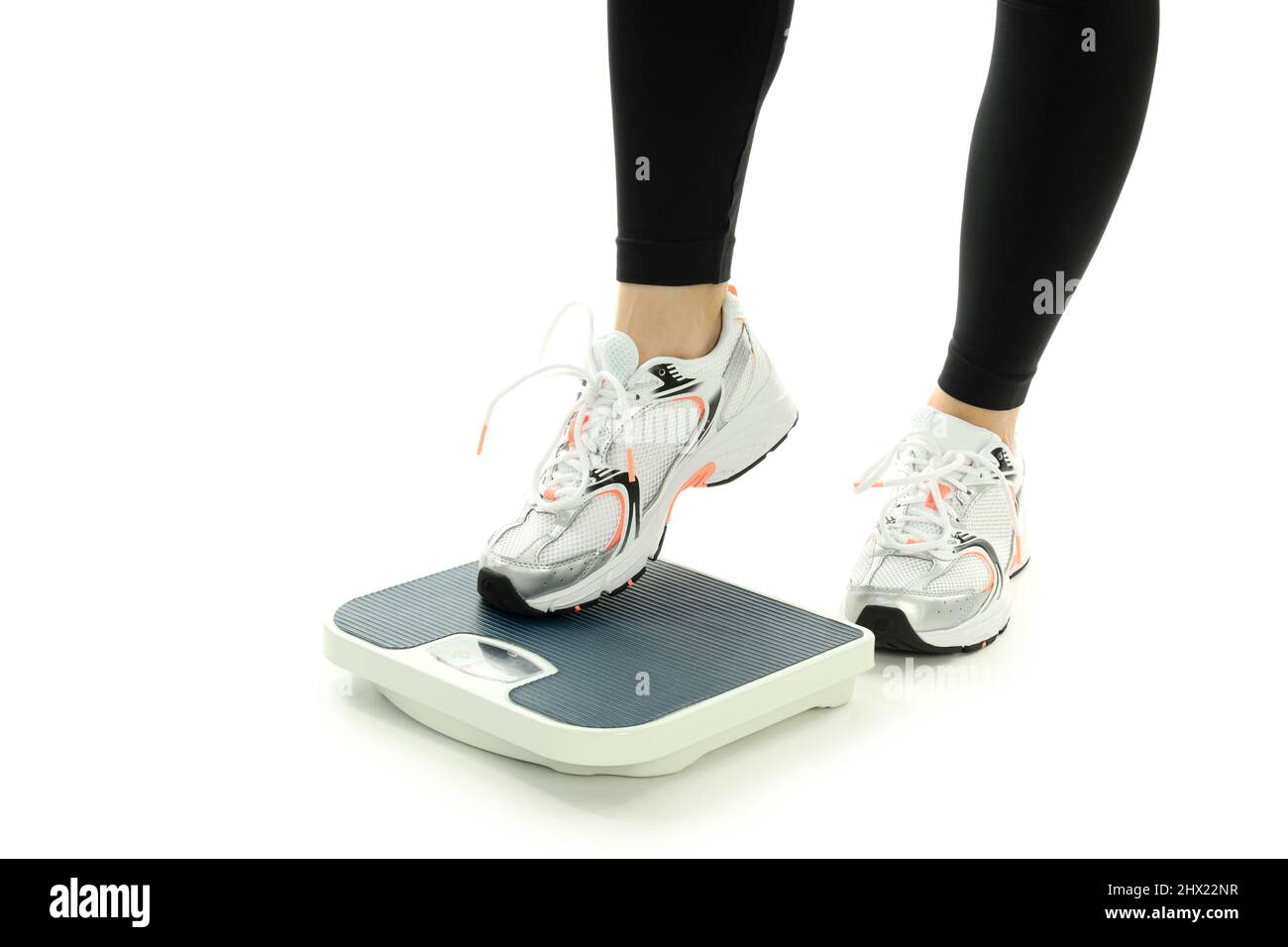 Female legs in sportswear and scales isolated on white background Stock ...