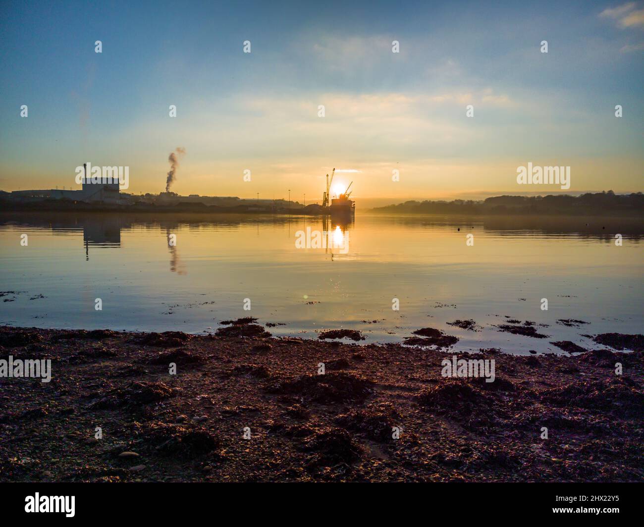 Beautiful evening on the river bank of the River Foyle at Culmore Point ...