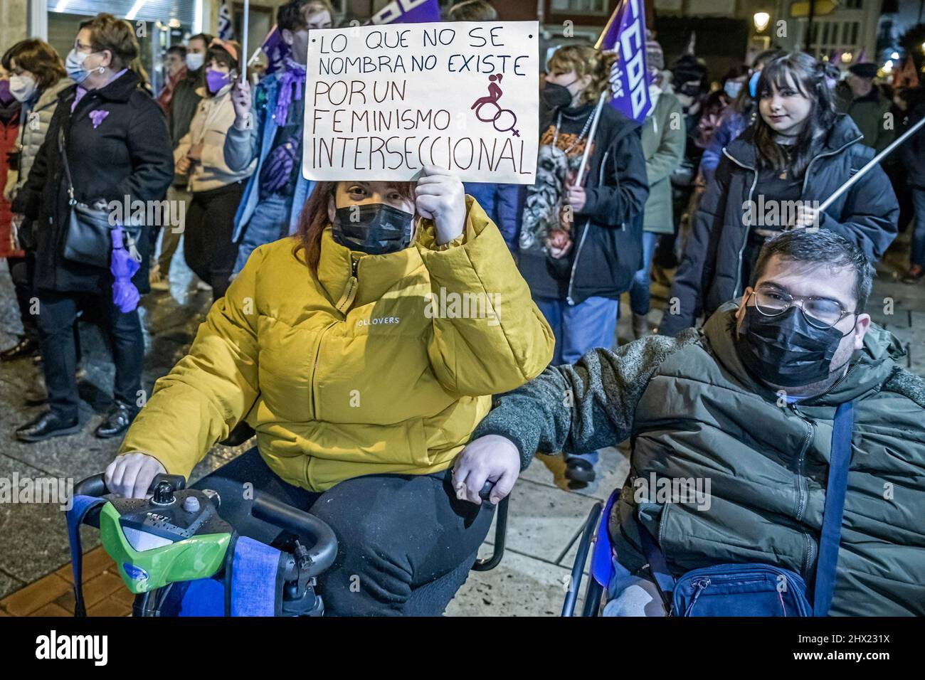 Two disabled protesters in wheel chairs seen during the International ...