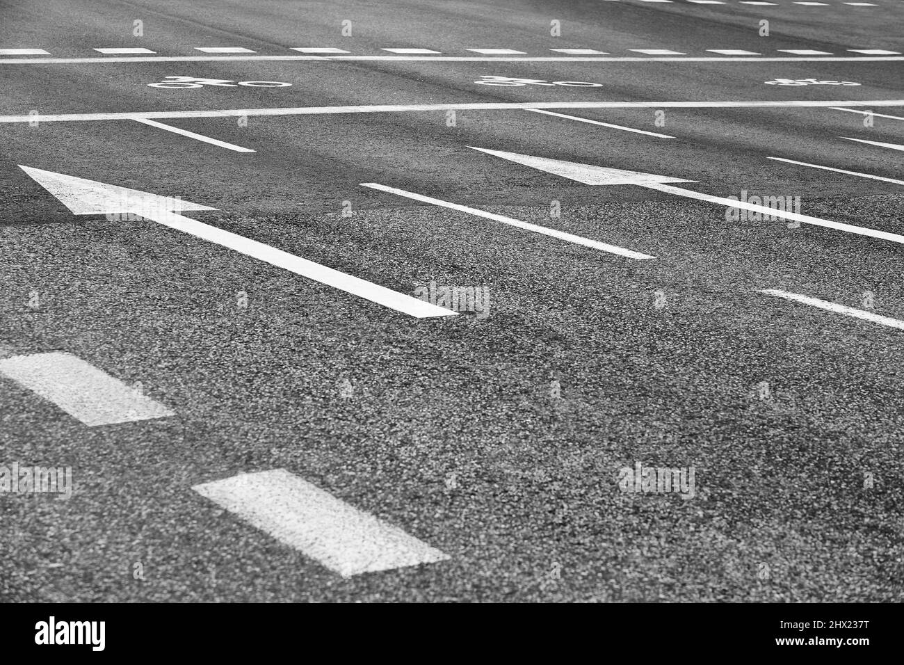 Asphalt street with several lines and bike lane. Empty downtown Stock ...