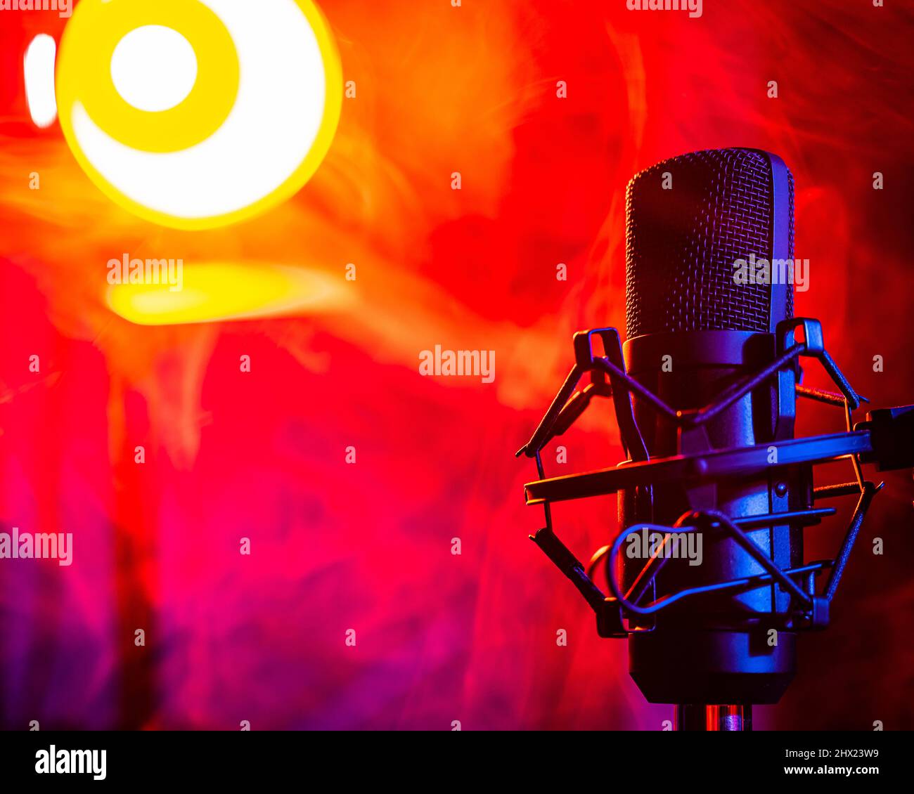 Professional microphone in red smoke on a black background Stock Photo ...
