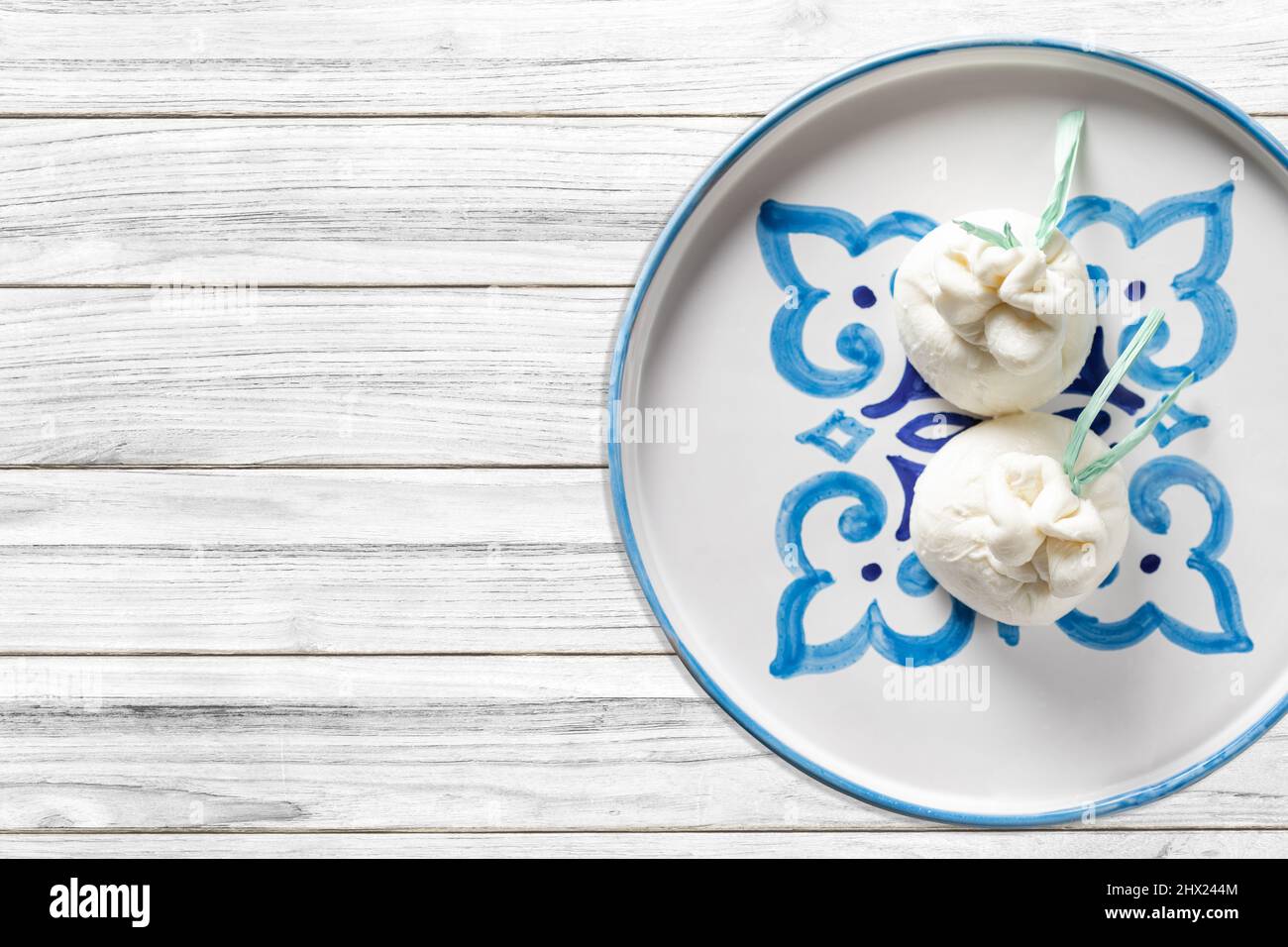 Italian burrata cheese made from mozzarella with cream inside from ...