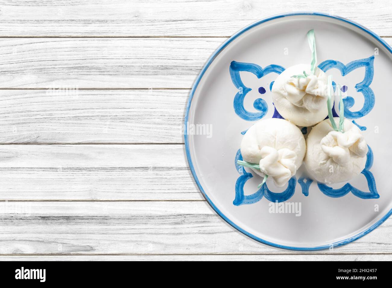 Italian burrata cheese made from mozzarella with cream inside from ...