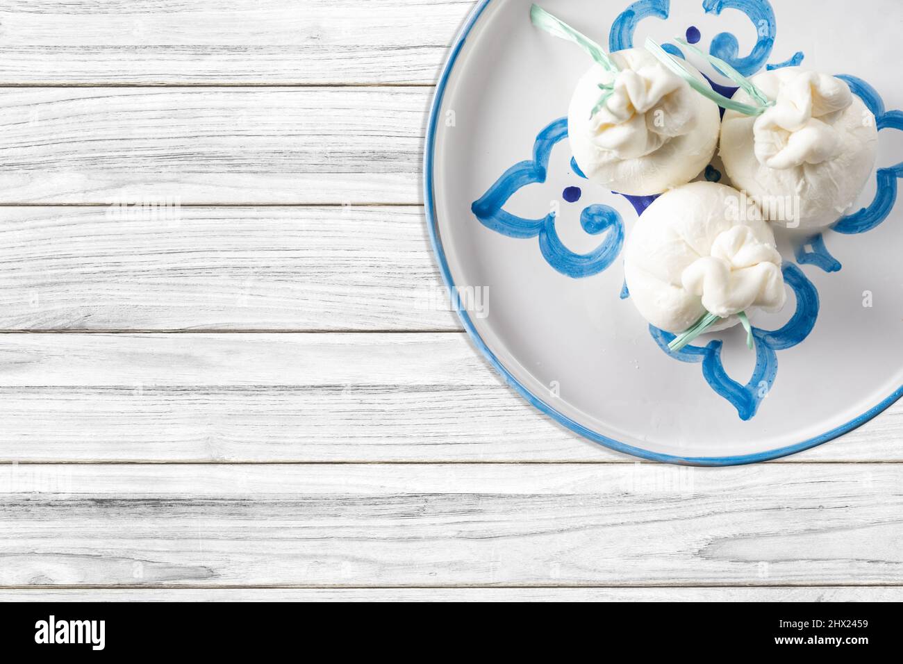 Italian burrata cheese made from mozzarella with cream inside from ...