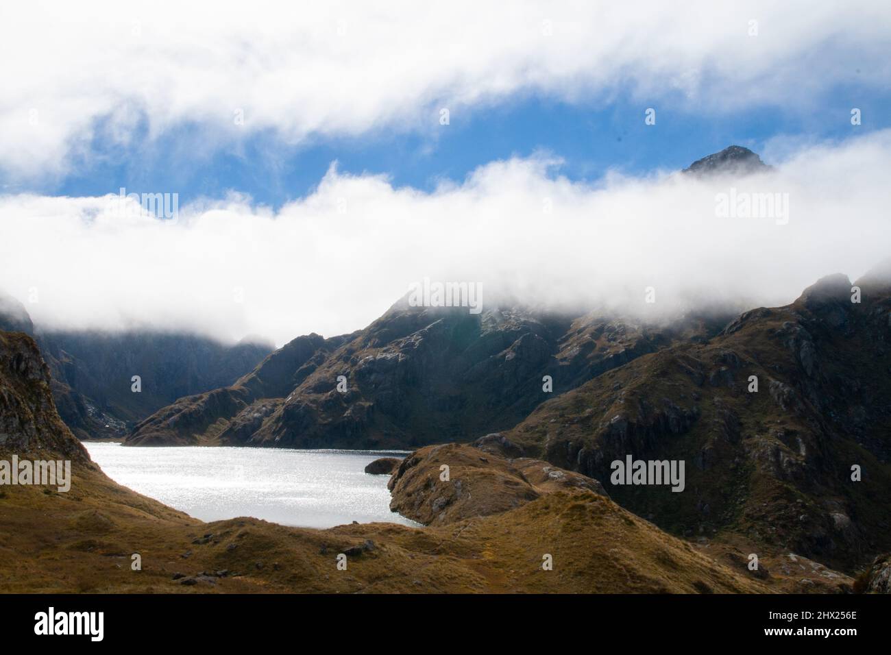 Cloudy mountains scenery and Lake Harris, Southern Alps, Routeburn ...
