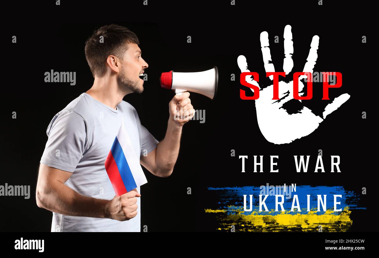 Screaming man with flag of Russia and megaphone on dark background with ...