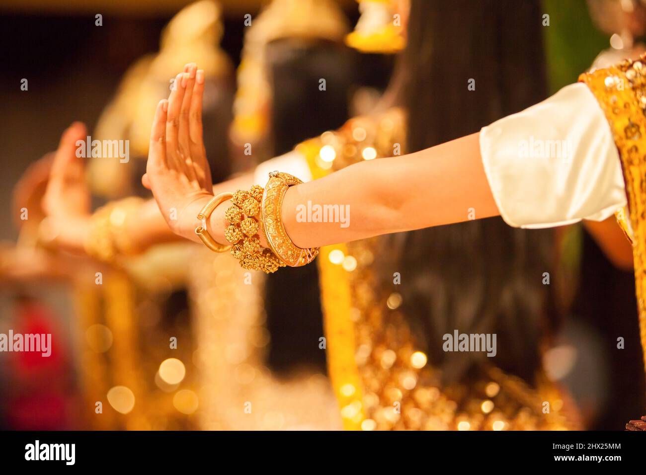 Graceful hands of Khmer Apsara dancers in traditional costume performs ...