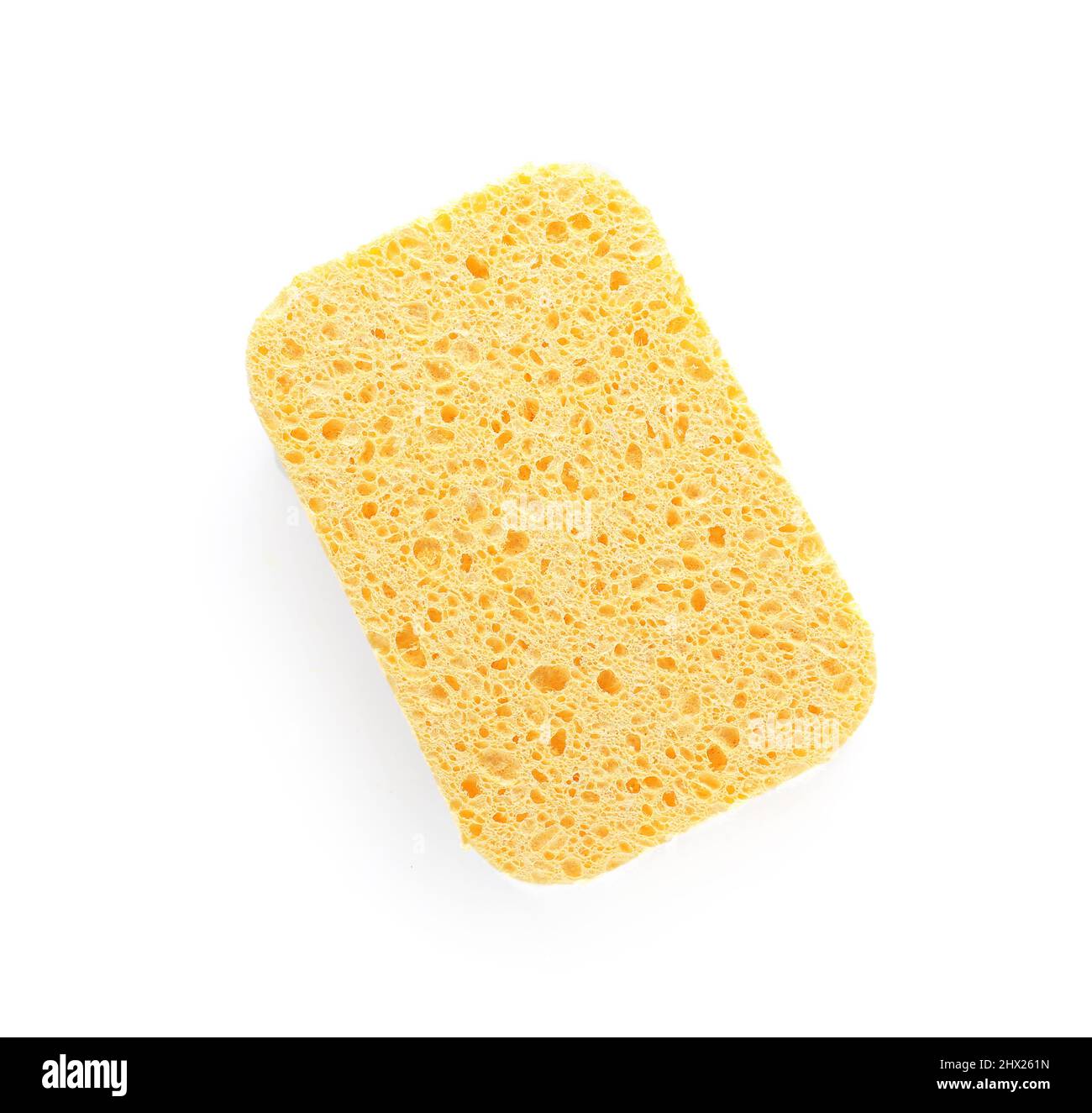 Yellow bath sponge on white background Stock Photo - Alamy
