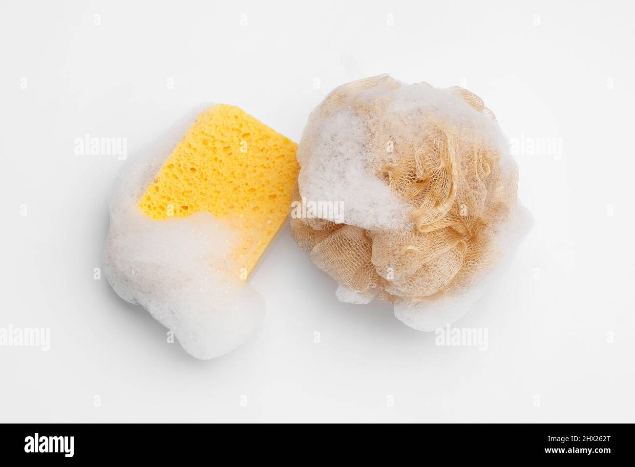 Soft soapy sponges with foam isolated on white background Stock Photo ... Soft soapy sponges with foam isolated on white background Stock Photo ...