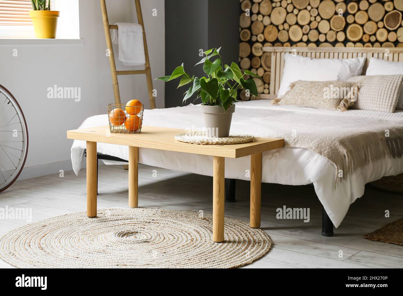 Interior of modern bedroom with banquette Stock Photo - Alamy