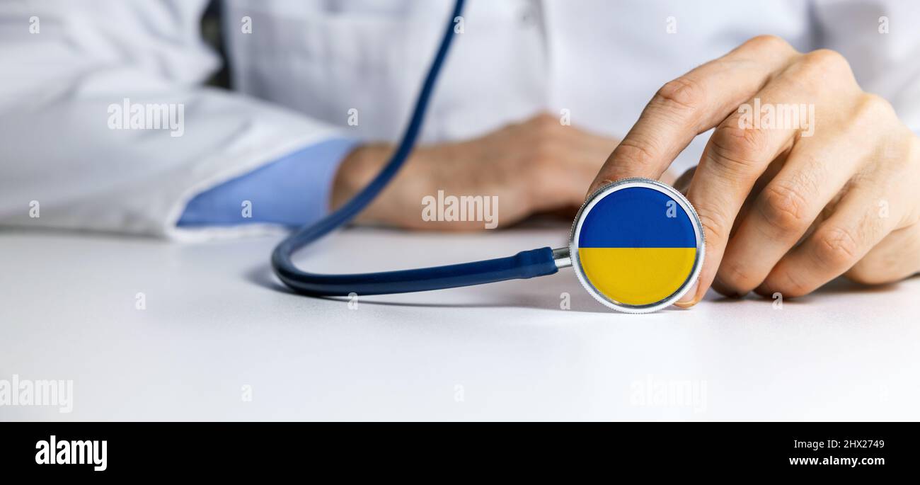 Ukraine medical help and support - doctor holding stethoscope with ...