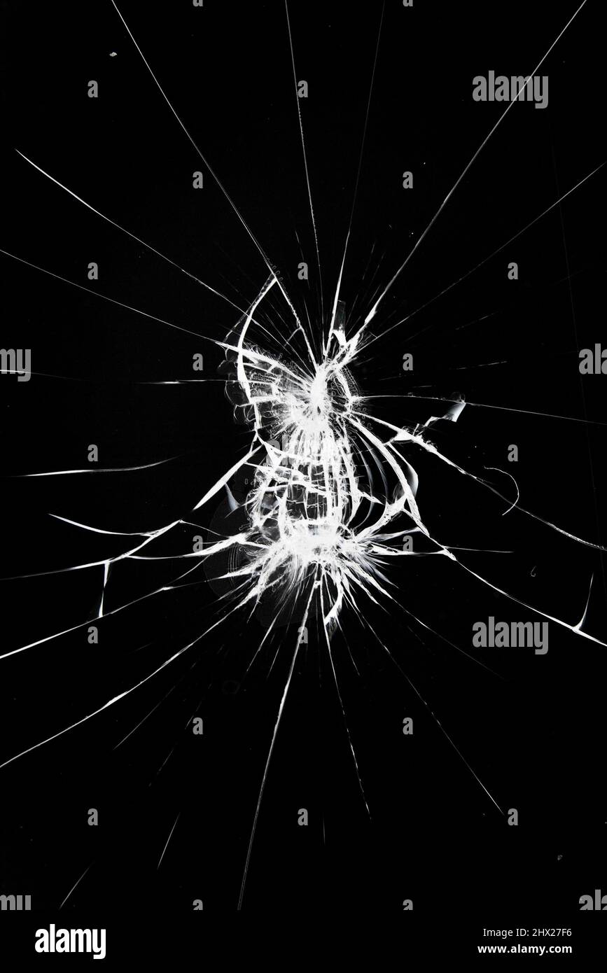 White lines of cracks on the glass. Broken glass texture effect Stock ...