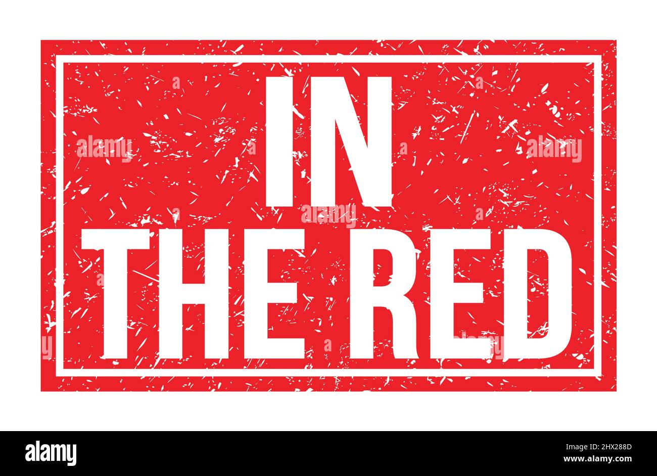 IN THE RED, words written on red rectangle stamp sign Stock Photo - Alamy