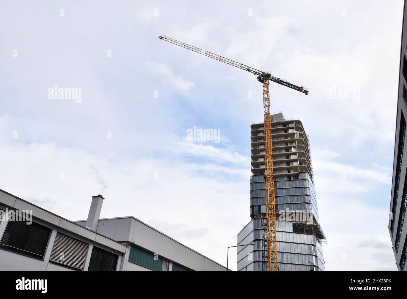 Crane and building under construction , modern architecture Stock Photo ...