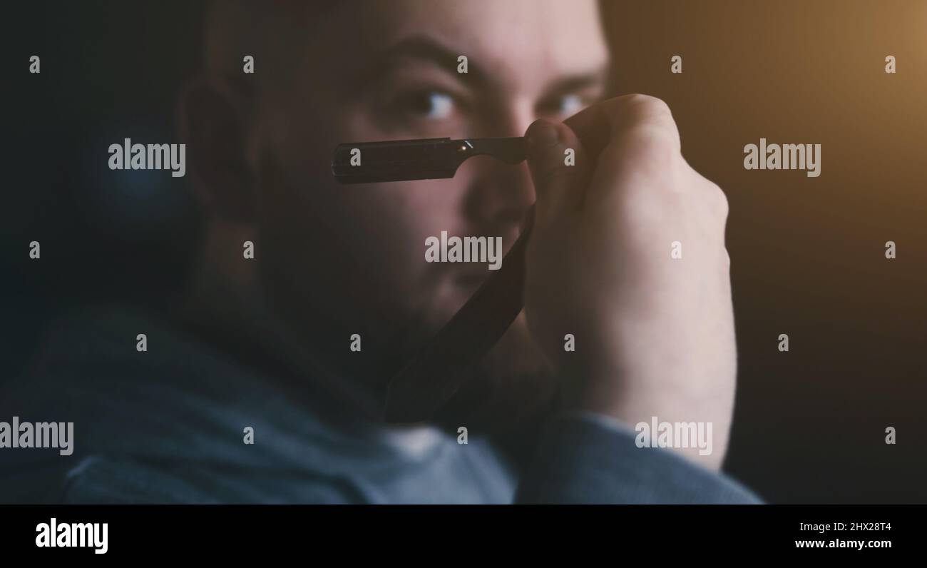 Razor sharp. Barber shop tools. Man visiting hairstylist in barber shop ...