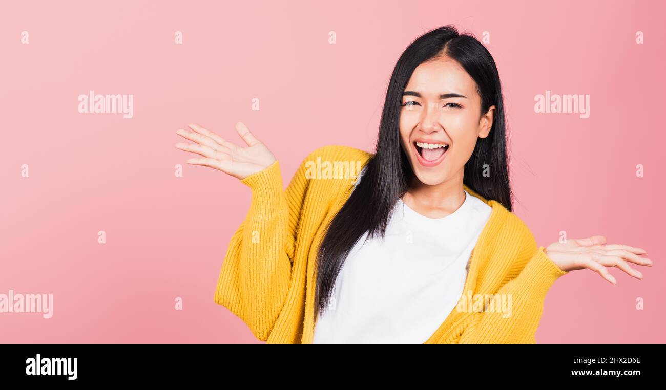 Happy Asian portrait beautiful cute young woman standing winning and ...